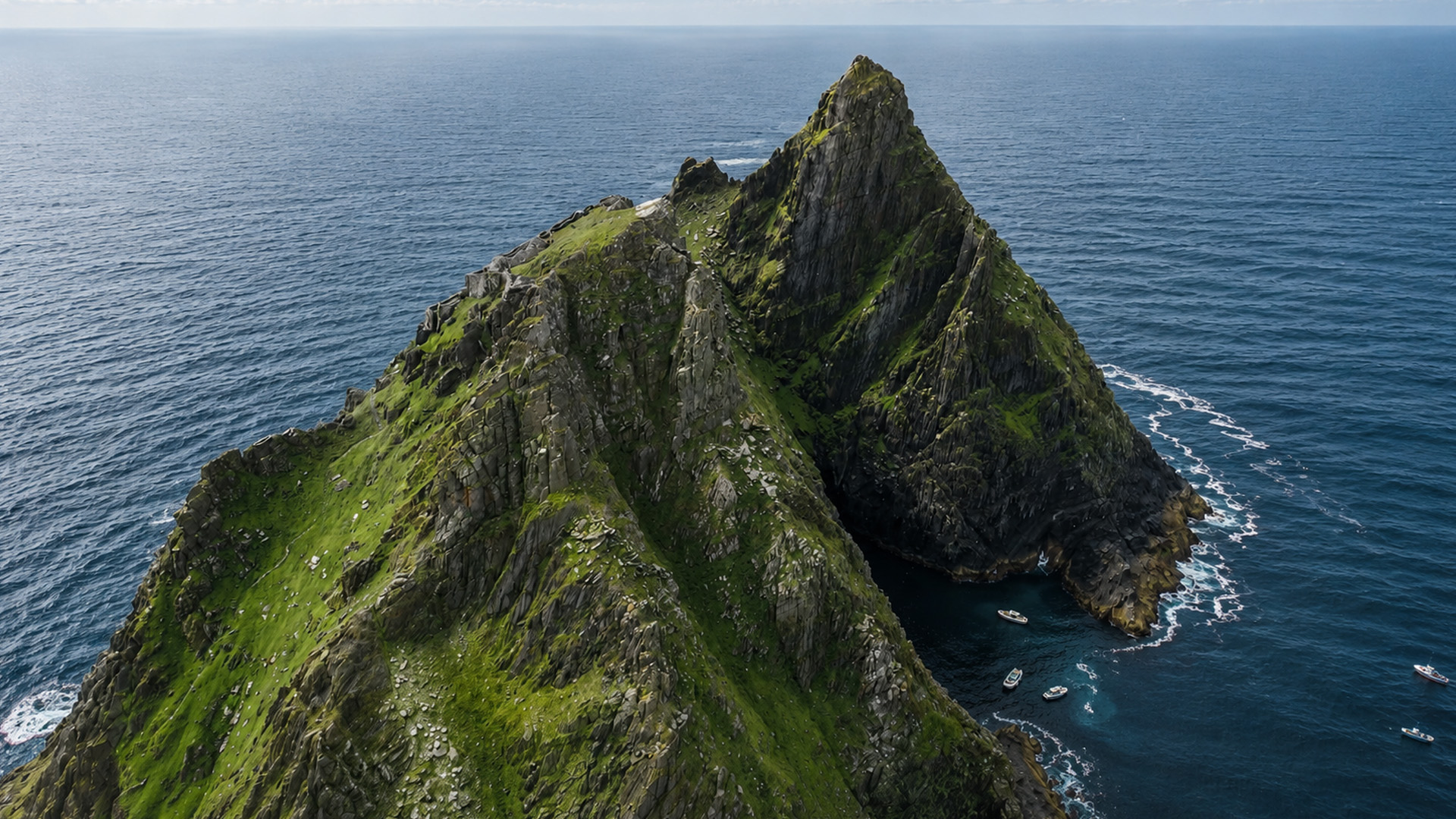 Towering green cliffs above the wild Atlantic waters