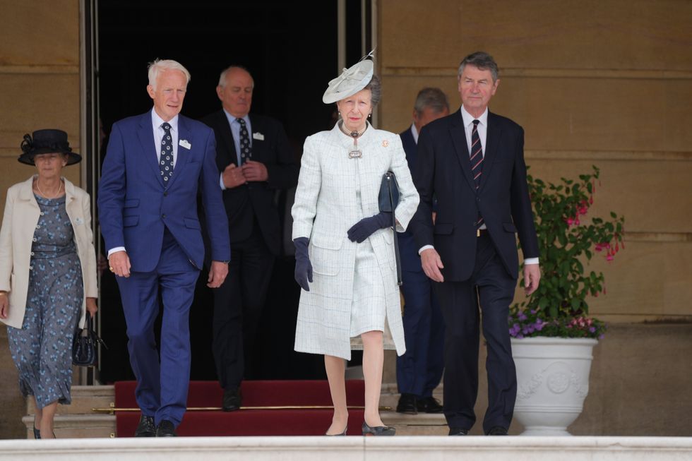 Princess Anne told to 'slow down' by veteran, 100, at Buckingham Palace ...