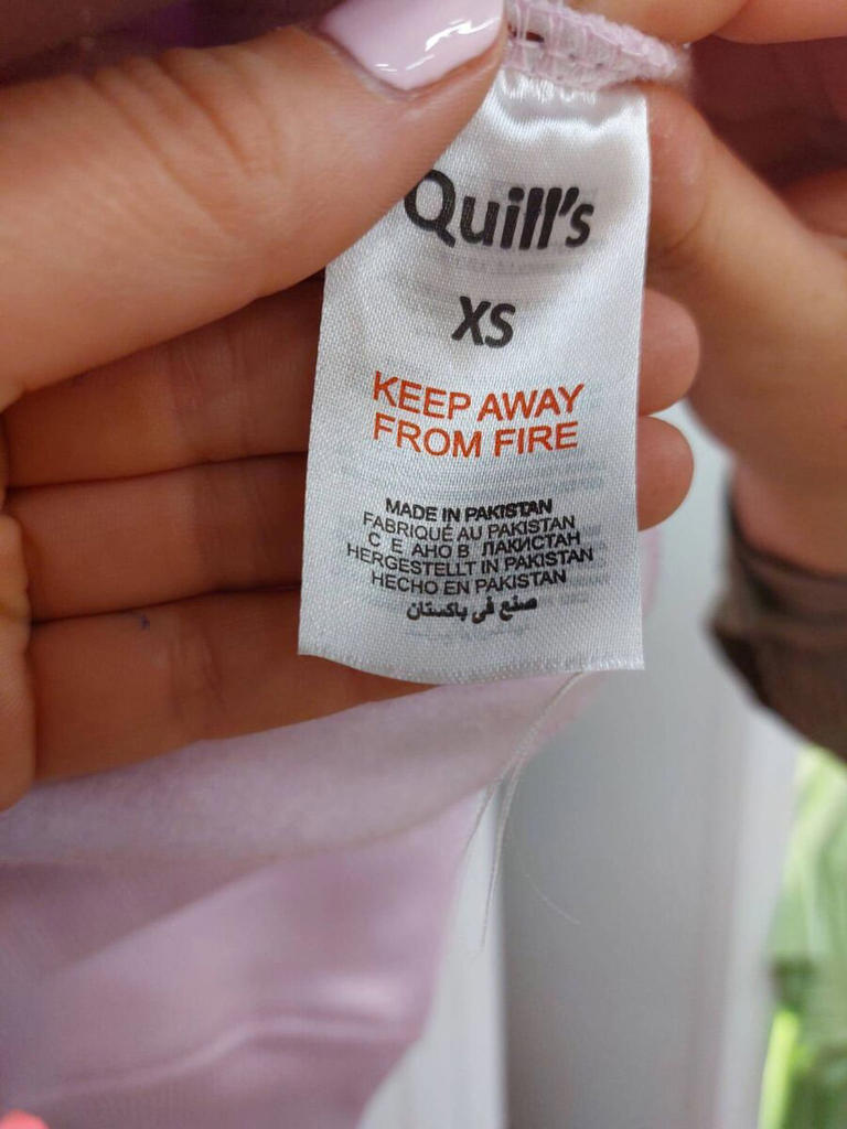 Quills cut off 'Made in Pakistan' sweatshirt labels in deliberate ...
