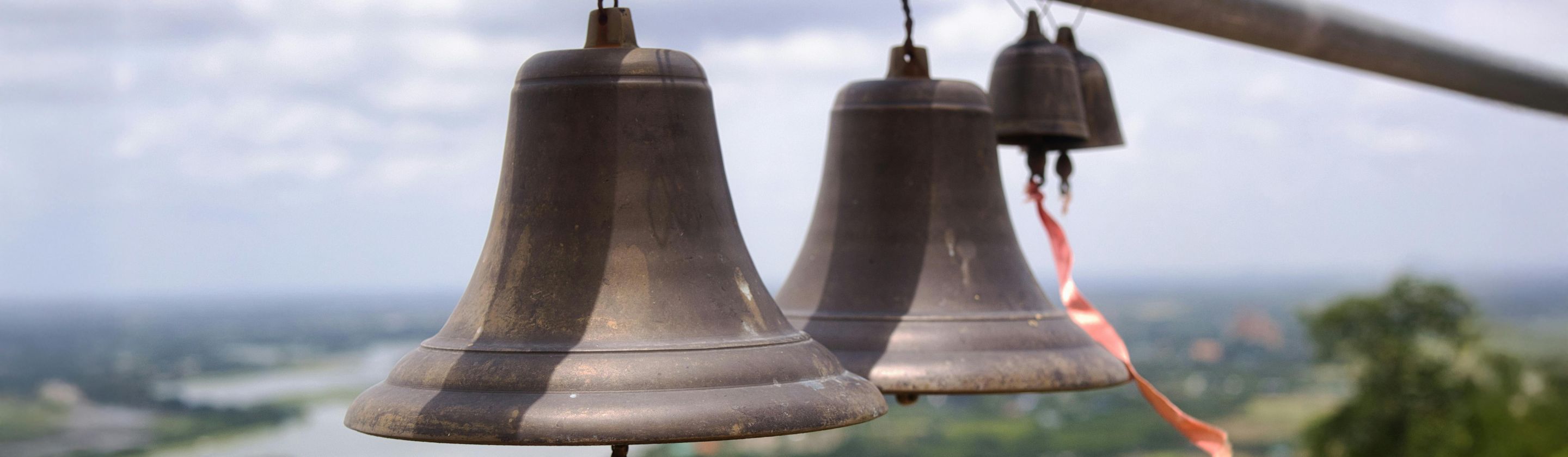 The history of bells, sirens, and other sounds used to control public life