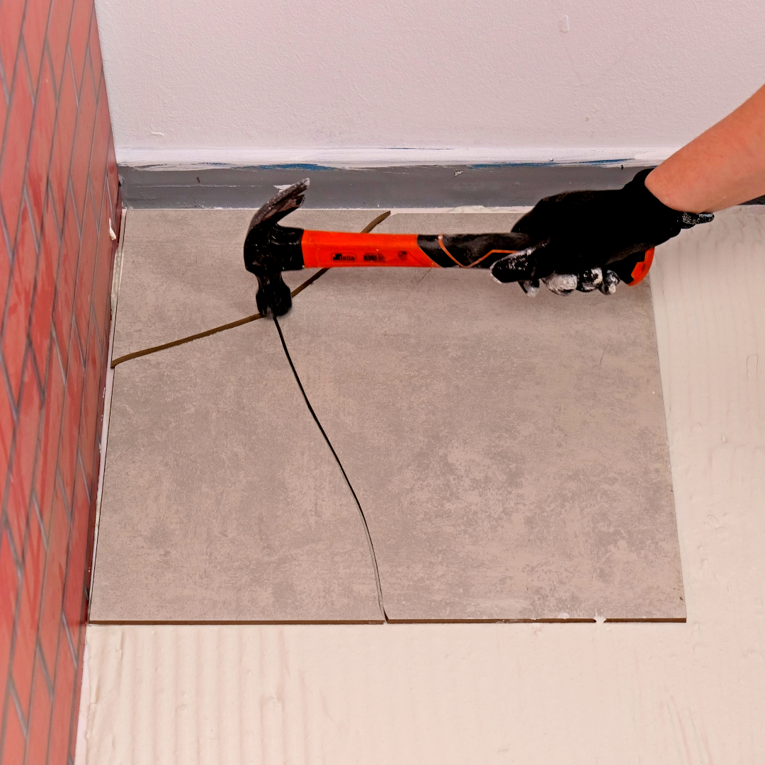 Breaking tiles to create a pattern