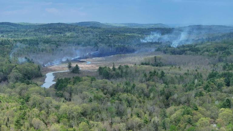 Crews from multiple departments battle Greene brush fire along railroad ...