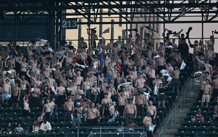 Tigers fans ditch shirts as 'Tarps Off' takes over Comerica Park