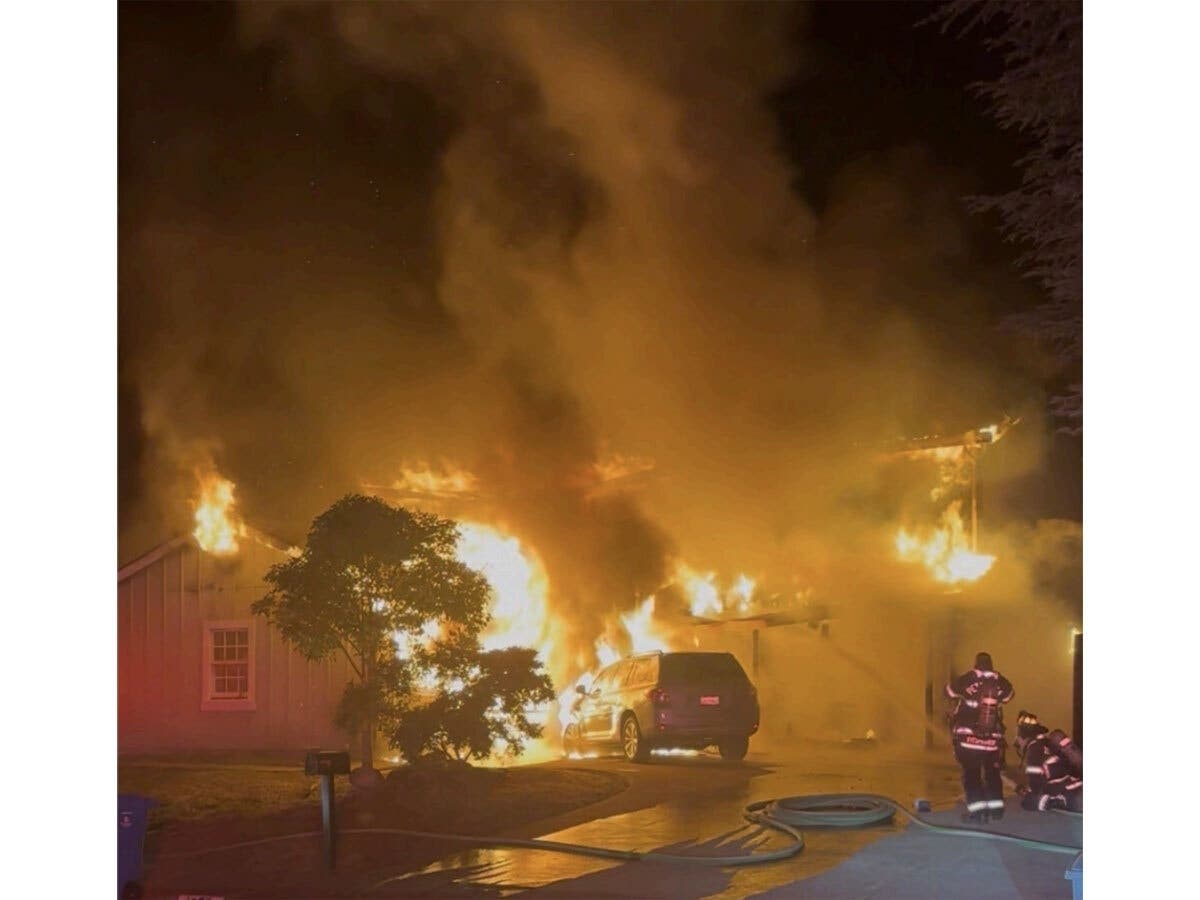Residents escape as flames rip through home in quiet neighborhood