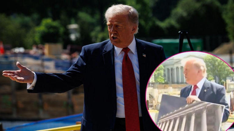 Donald Trump holds poster to hide his body during press briefing amid ...