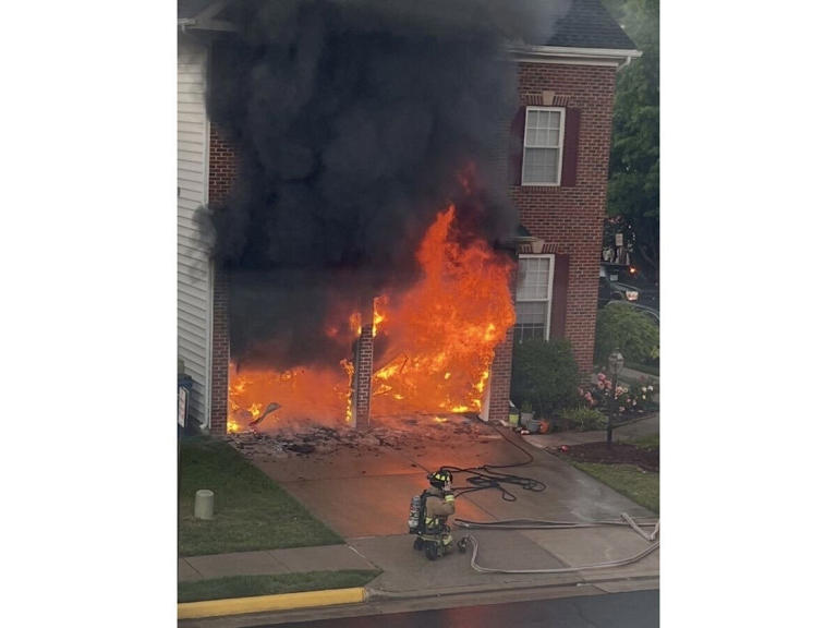 Fairfax County firefighters contain garage fire at Bulova Lane home
