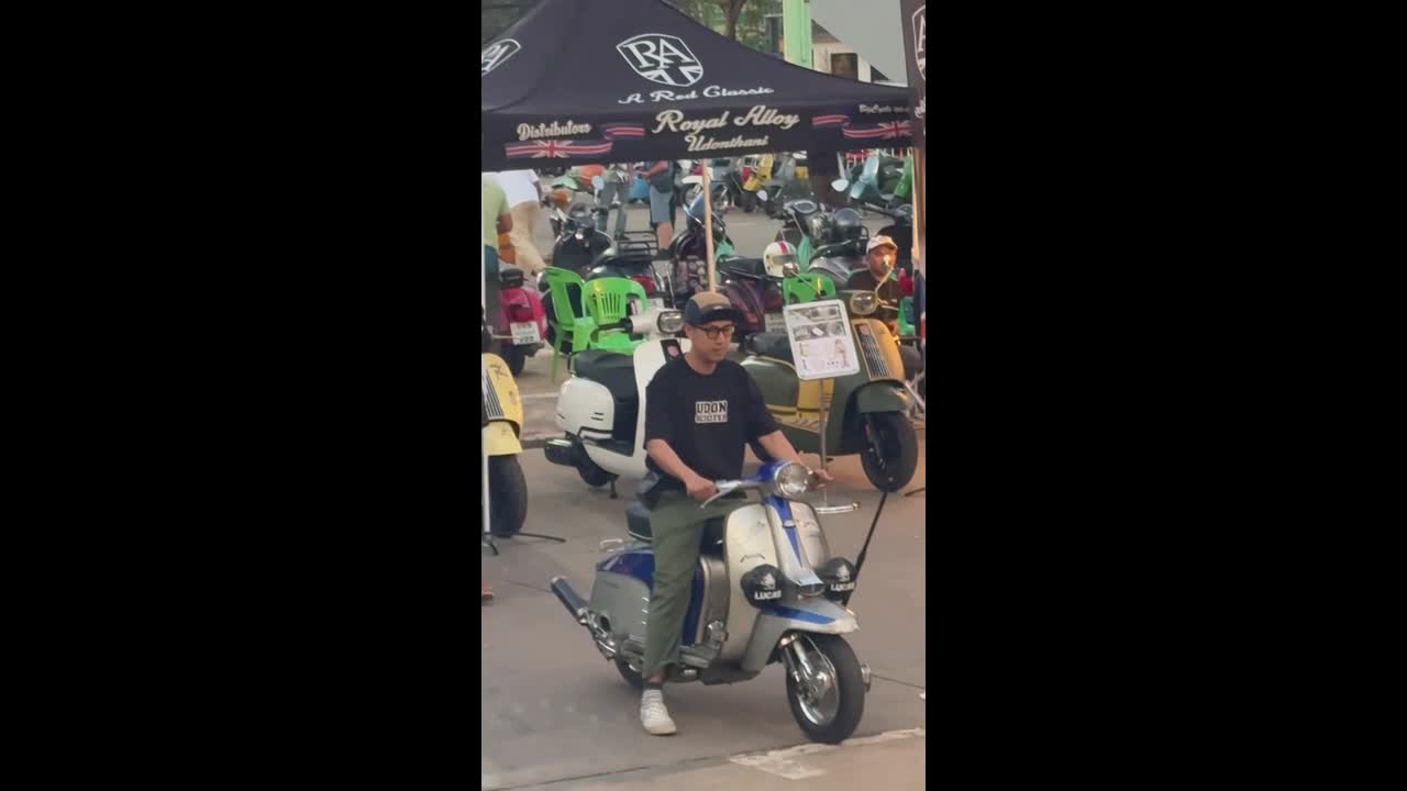 Scooter riders have hilarious 'slow race' in Thailand
