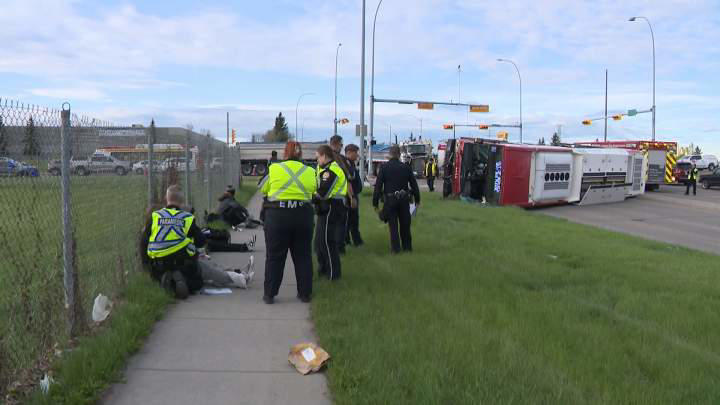 3 people taken to hospital after Calgary Transit bus rollover