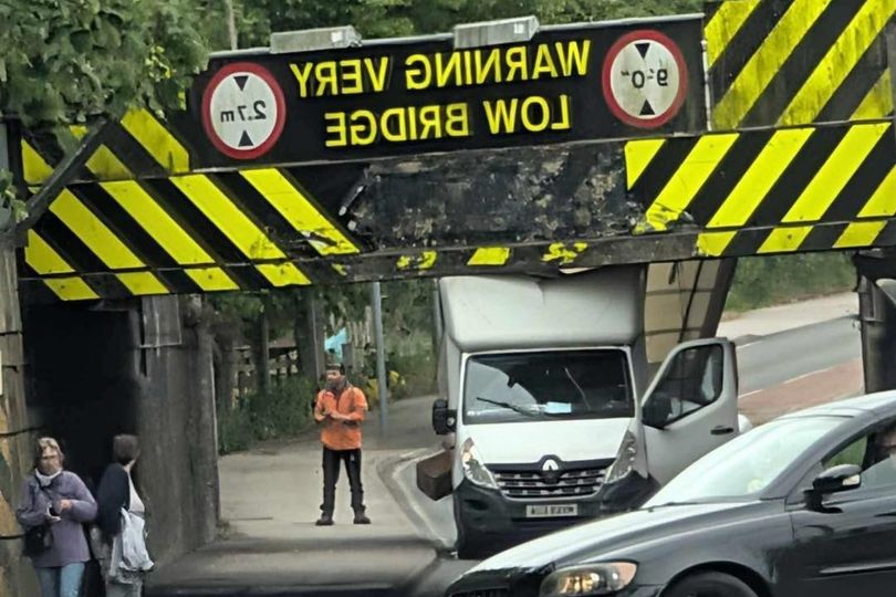 Van crashes into Cambridgeshire railway bridge causing delays