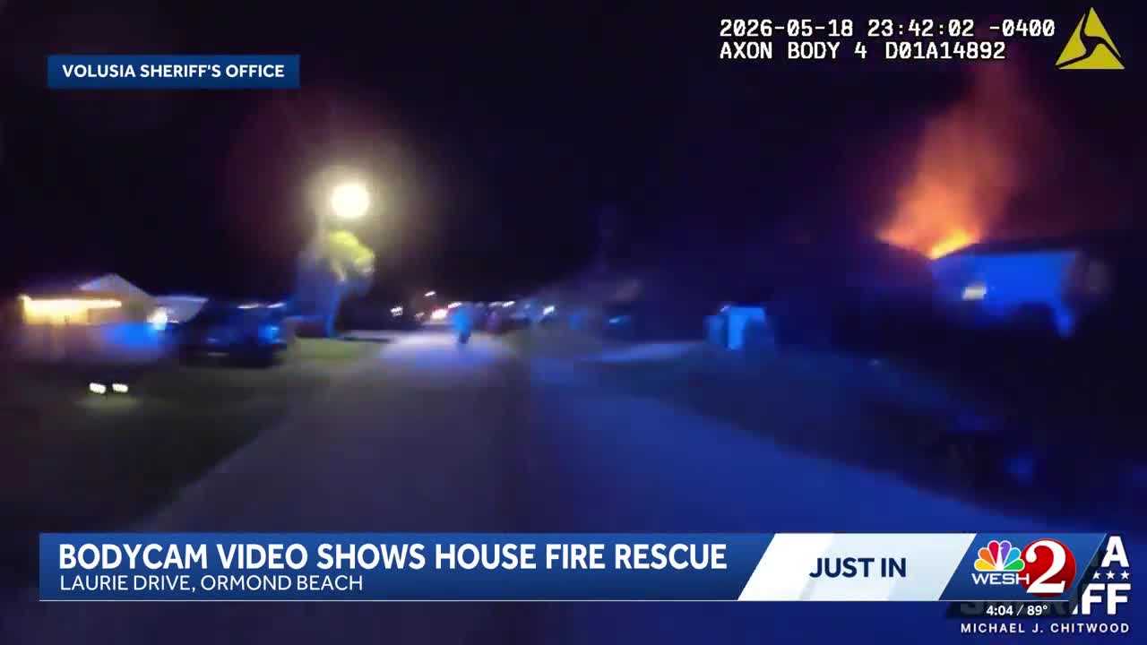 Video: Deputy rushes into burning home, rescues people inside