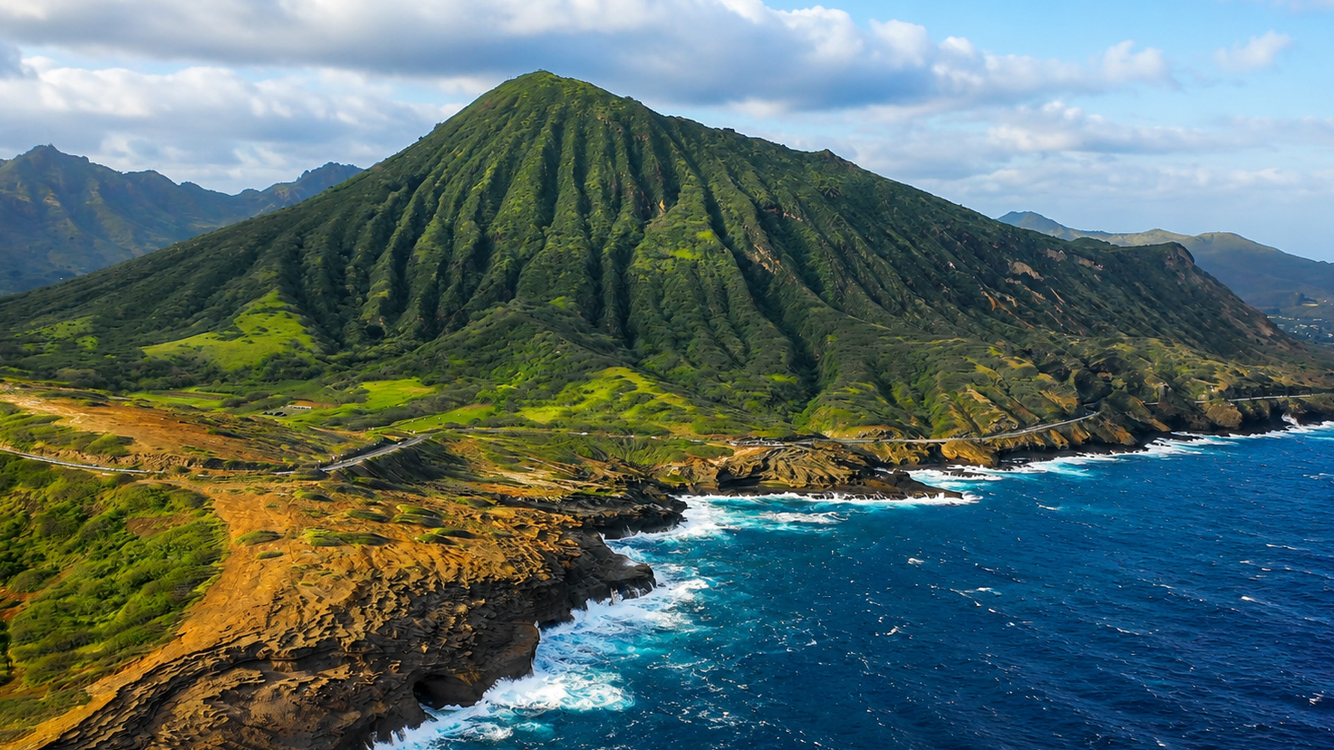 An island volcano rising straight from the ocean