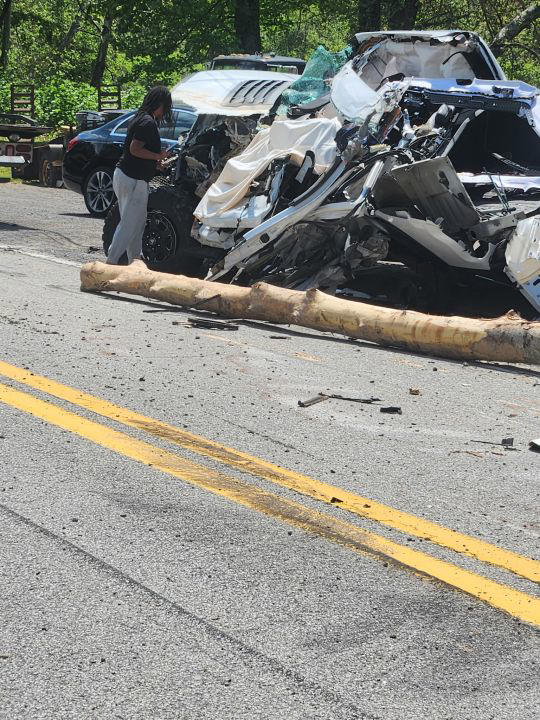 Photos: Wreck involving log truck shuts down US 50