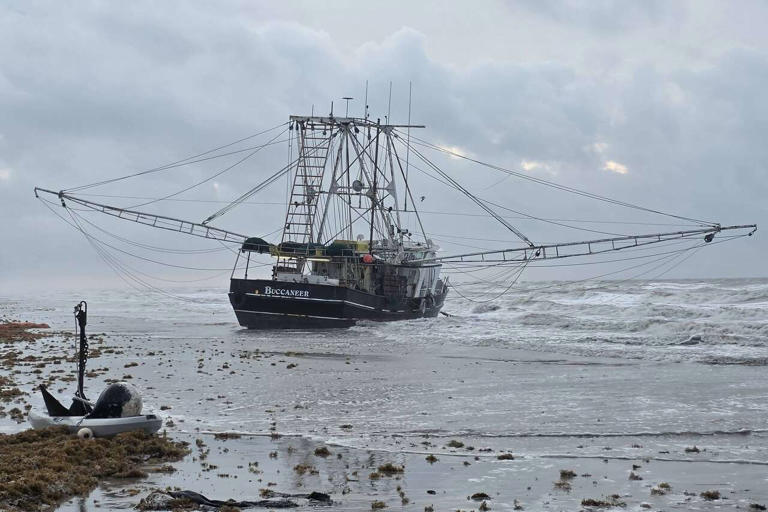 A stranded shrimp boat has become the latest spectacle on the Texas coast