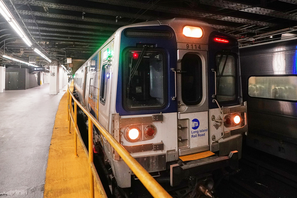 Busiest US commuter rail system resumes operations as deal reached to ...