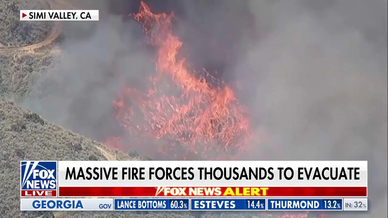 Fast-moving California brush fire scorches hundreds of acres