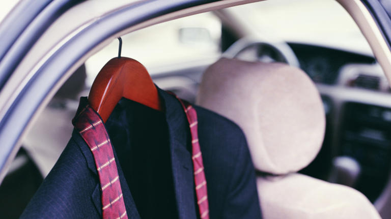 What are the hooks next to car grab handles for?