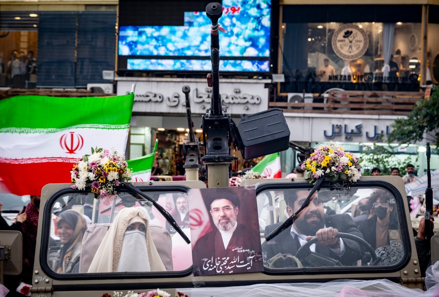 Iran holds weddings for citizens willing to 'self-sacrifice' in war