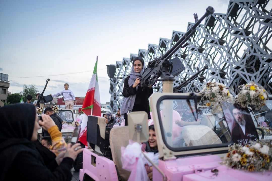 Iran holds weddings for citizens willing to 'self-sacrifice' in war