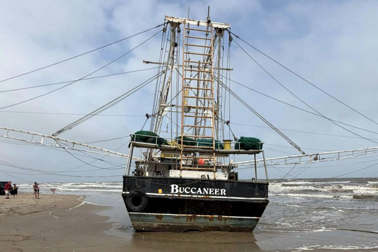 A stranded shrimp boat has become the latest spectacle on the Texas coast