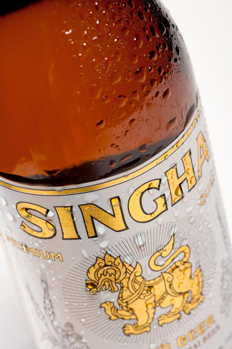 Thai beer heir fired after brother's abuse allegations