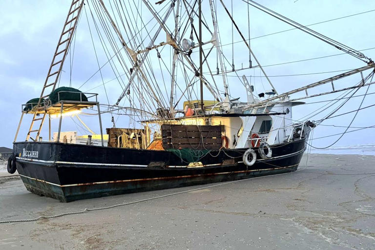 A stranded shrimp boat has become the latest spectacle on the Texas coast