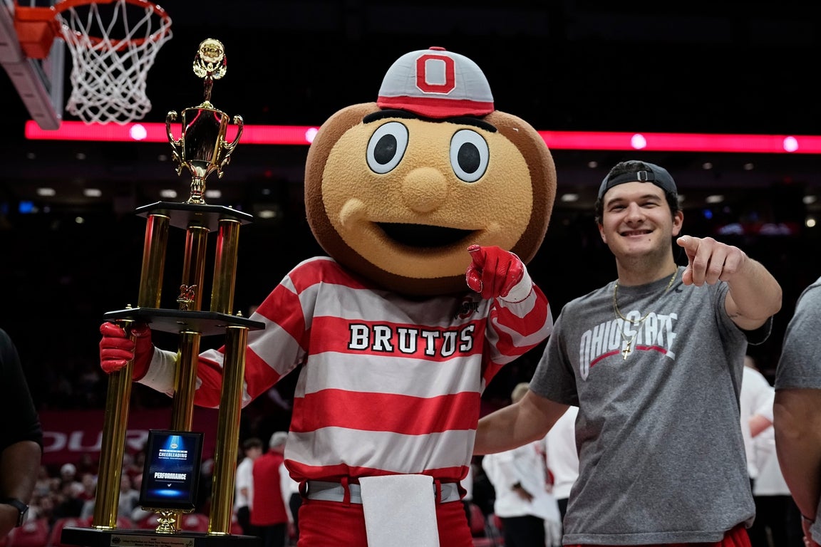 From rivalry games to national titles, Brutus Buckeye in photos