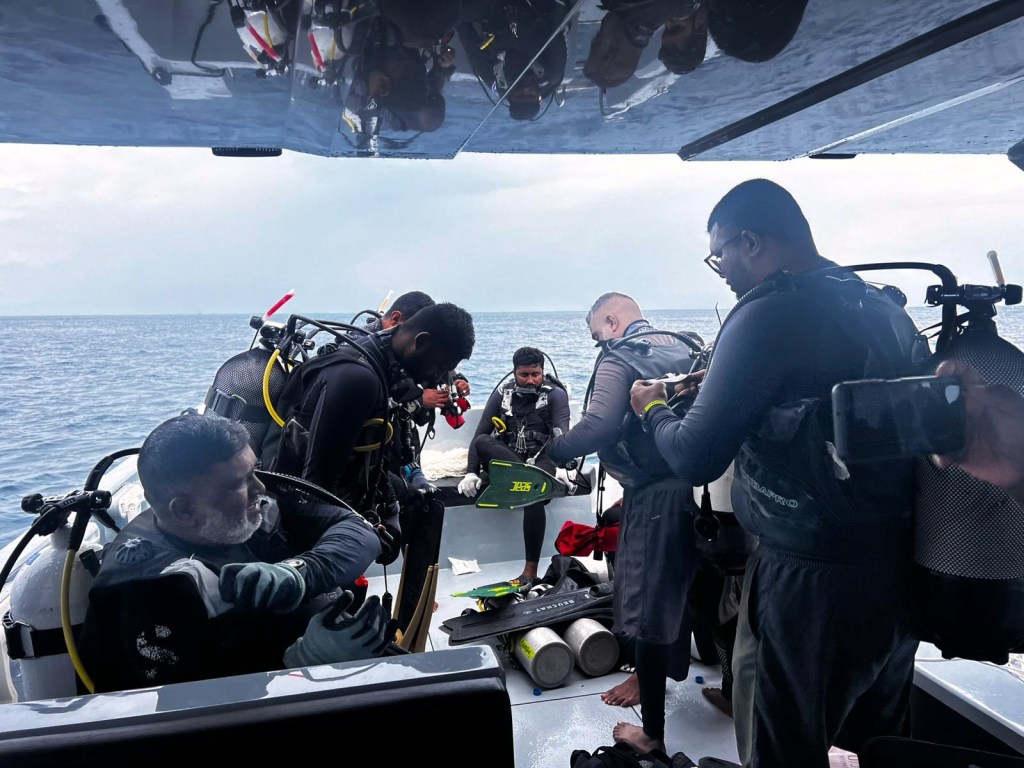 Boyfriend of Maldives diver was 'waiting for photos' of ocean when she died