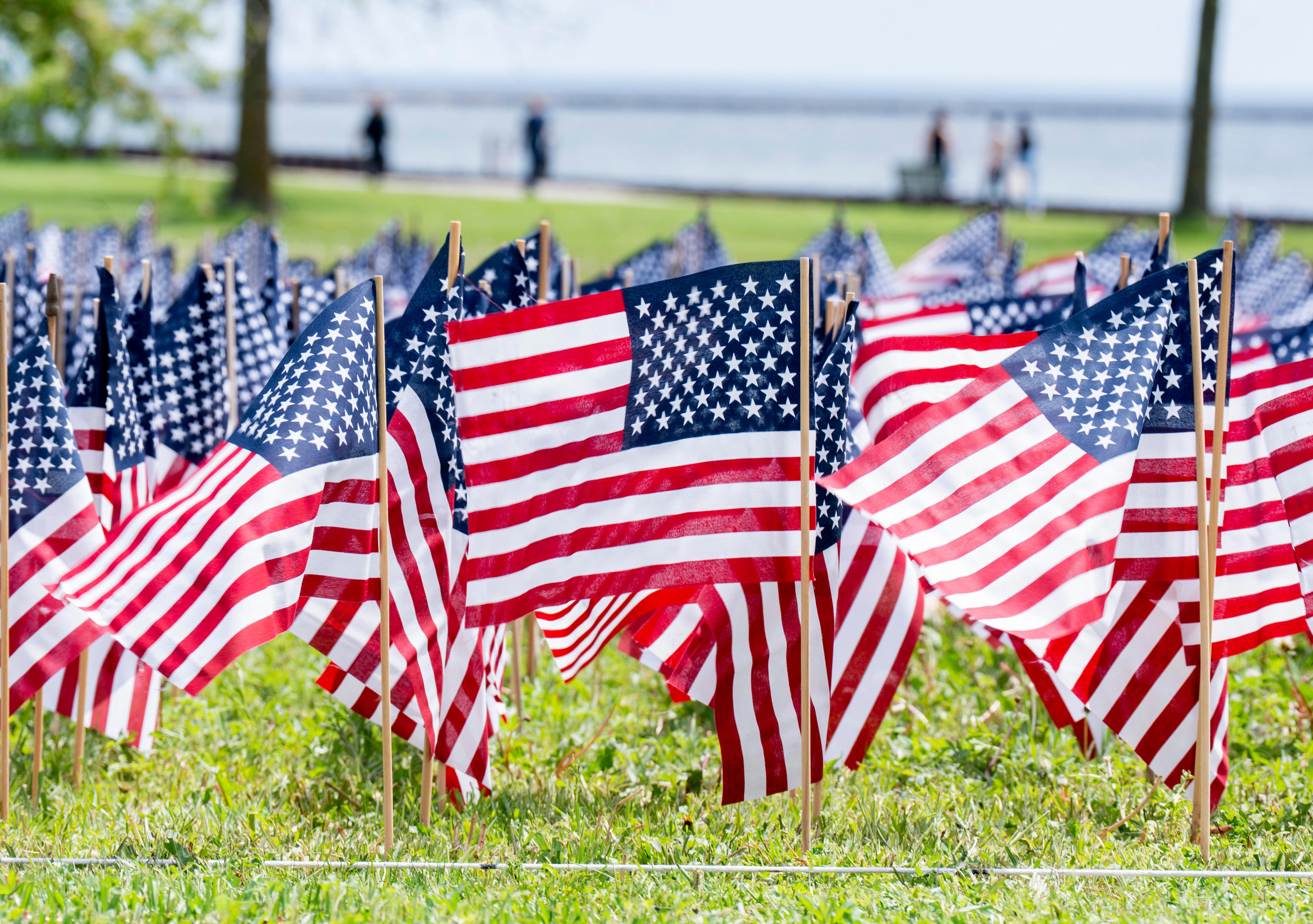 Olson Funeral honors veterans with 100 flag display