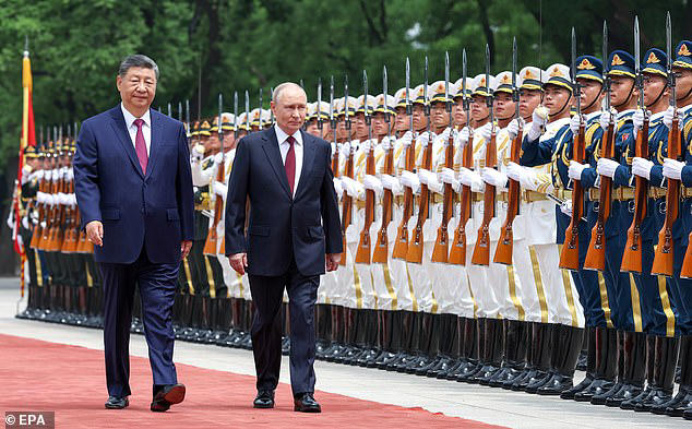 Xi takes a veiled swipe at Trump as he declares China and Russia must ...