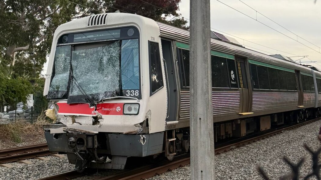 Train crashes into truck at Perth level crossing in Guildford, six injured