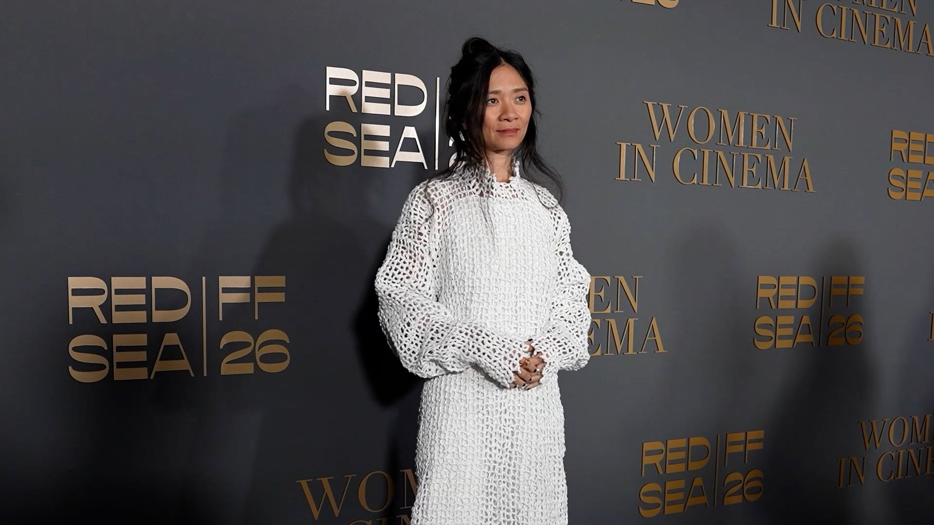 Chloe Zhao turns red carpet style into armor