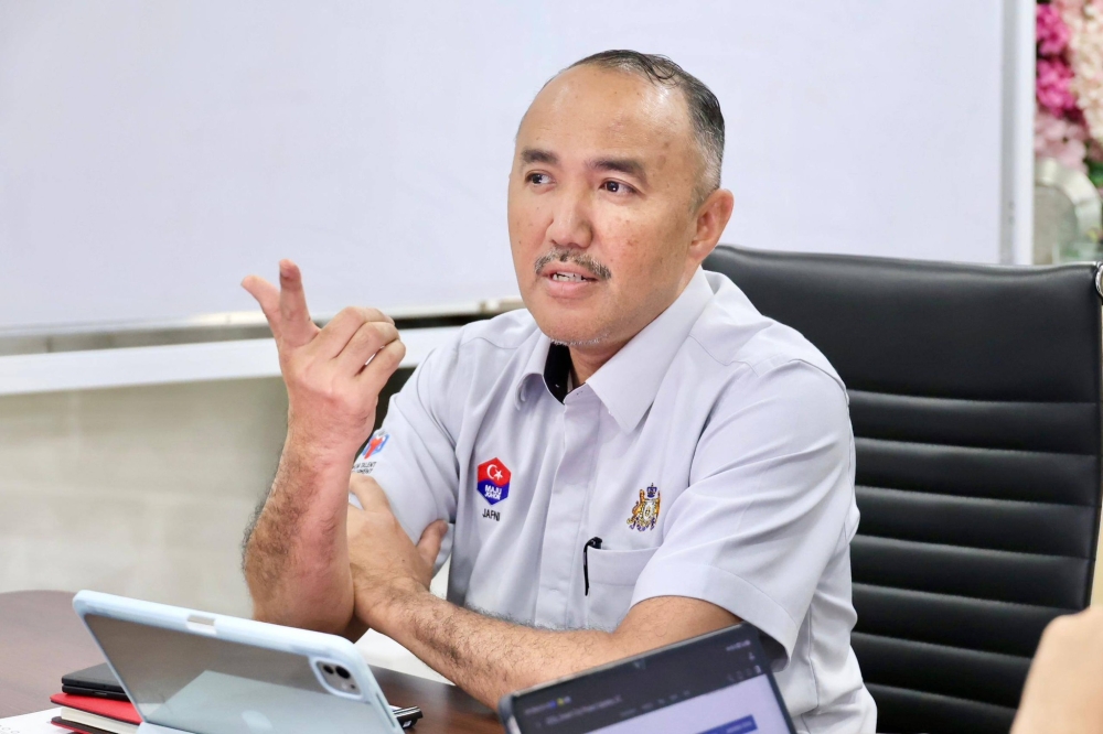 Johor exco vows action after MBJB contractors caught on CCTV running ...