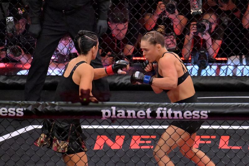 Mixed martial arts - Rousey's return against Carano draws record US ...