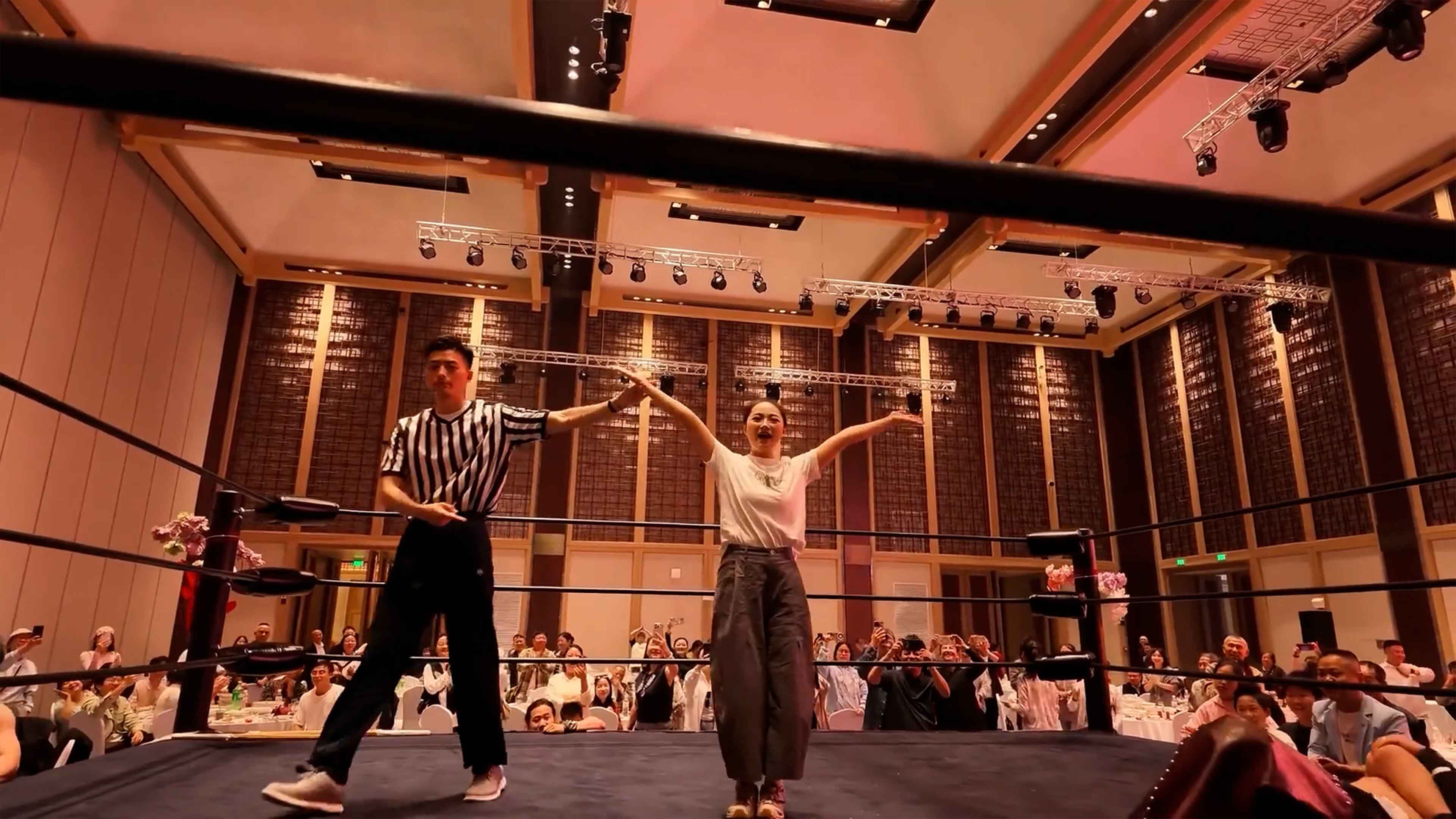 Newlyweds hold wrestling match at wedding with loser forced to do housework