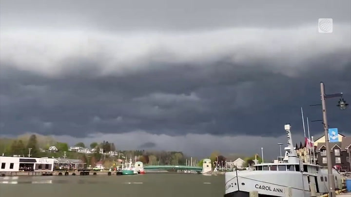 A dark, ominous shelf cloud spotted along the Lake Erie shoreline
