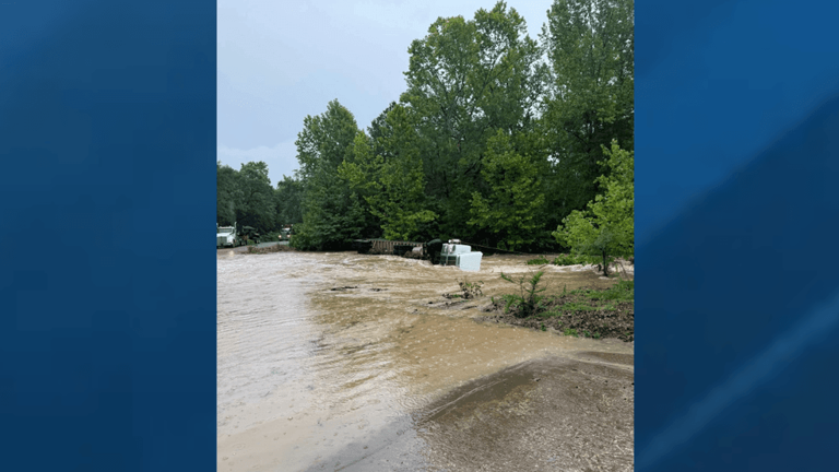 Gravel truck swept off road by floodwaters in McCurtain County