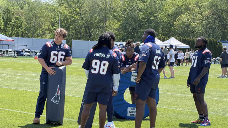 Patriots give back, teach football skills at community day
