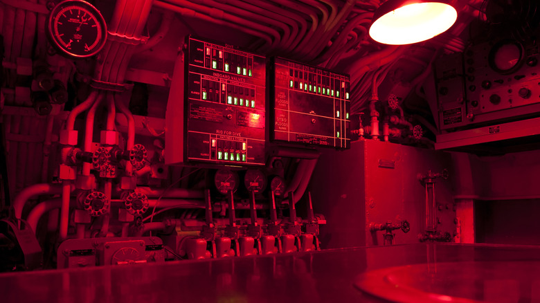 Why do submarines use red lights at night?