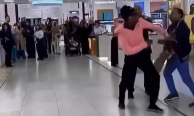 Brawl breaks out at Selfridges as men kick, punch and wrestle while ...