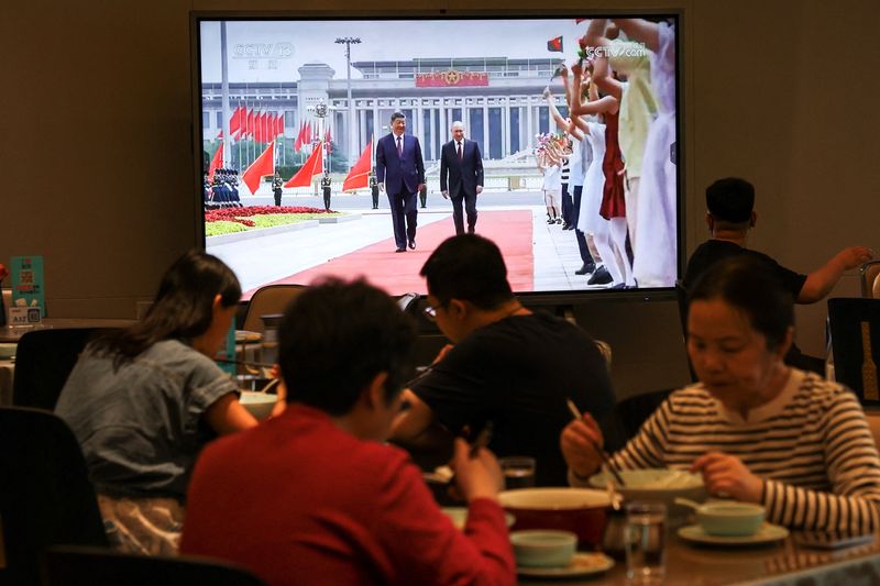 Xi and Putin to dine over Peking duck, Chinese opera and Swan Lake