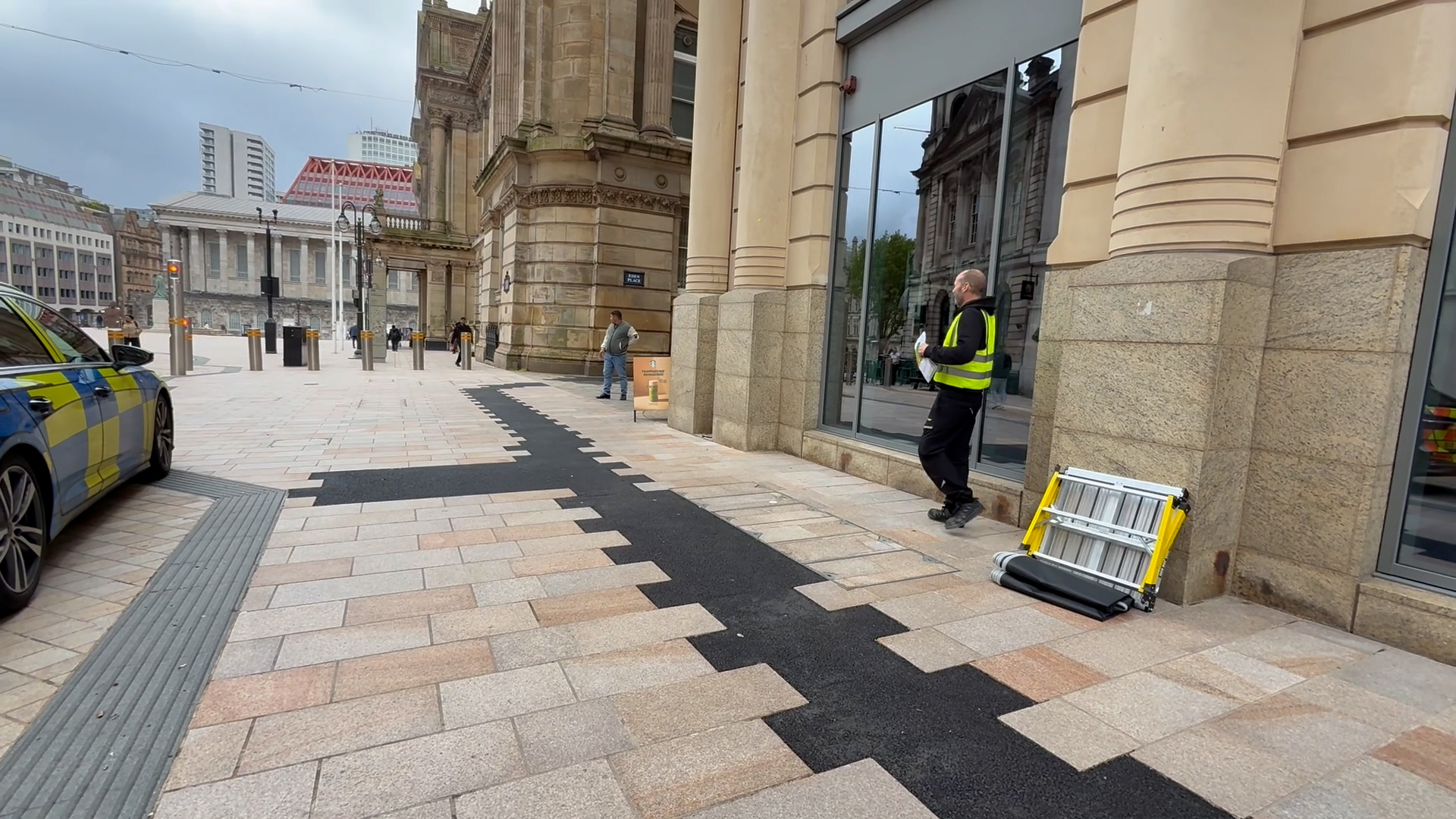 Historic streets in city centre repaved with patchy tarmac leaving ...