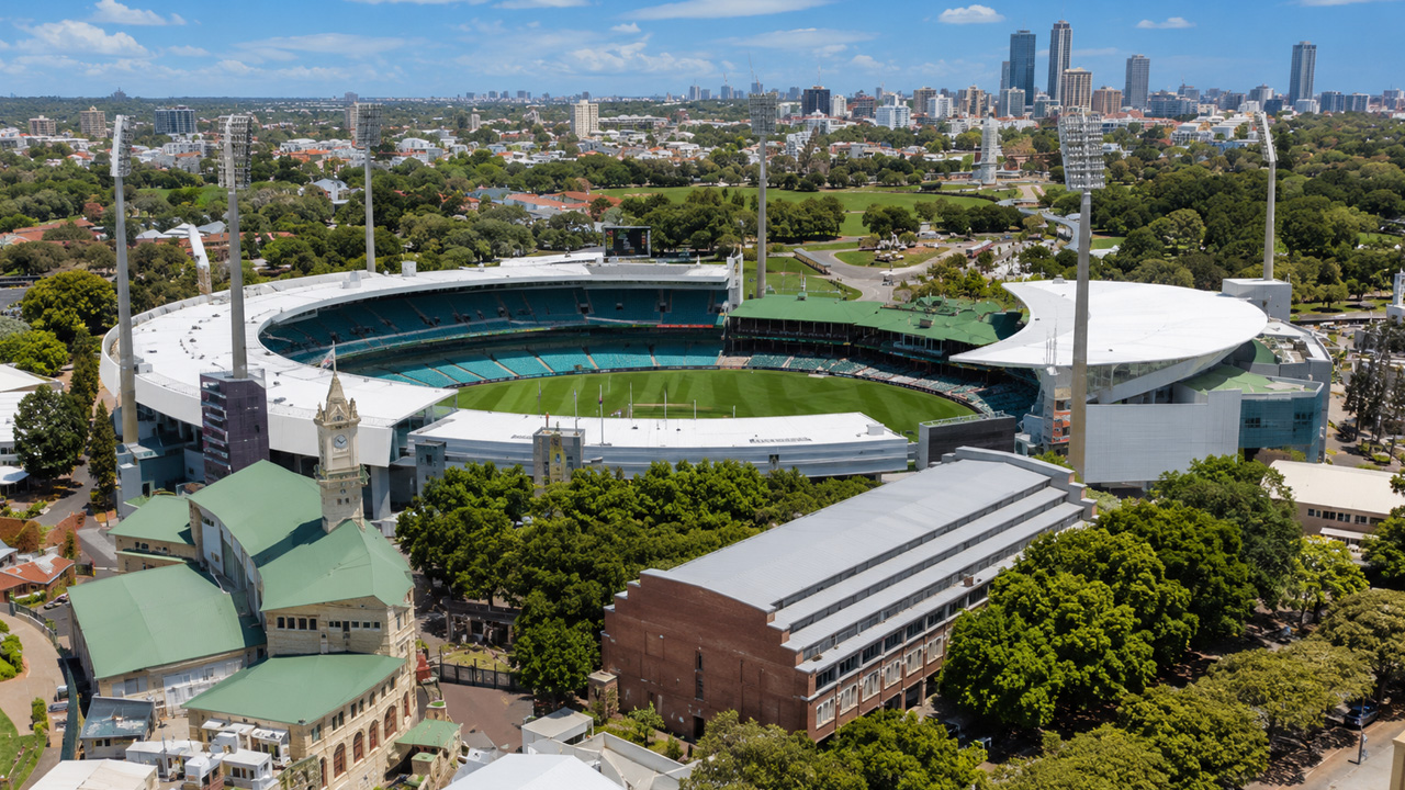 Sydney cricket ground surrounded by parks and city skyline