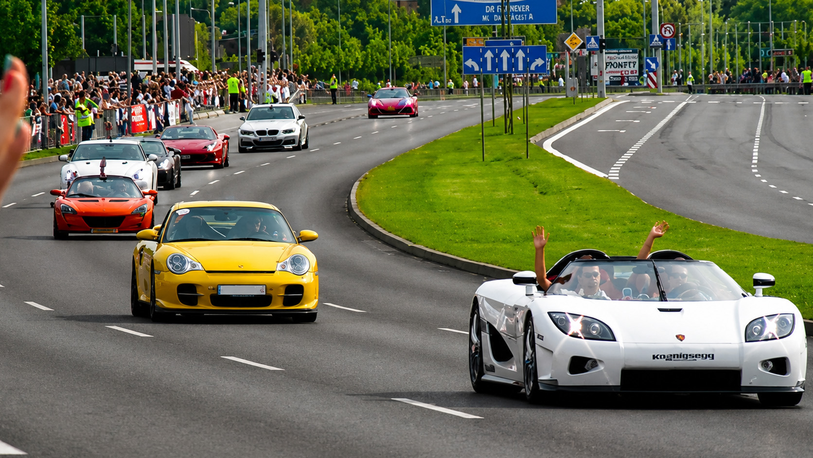 Supercar parade turns the road into a rolling showcase