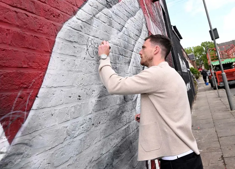 Andy Robertson visits his Anfield mural ahead of exit