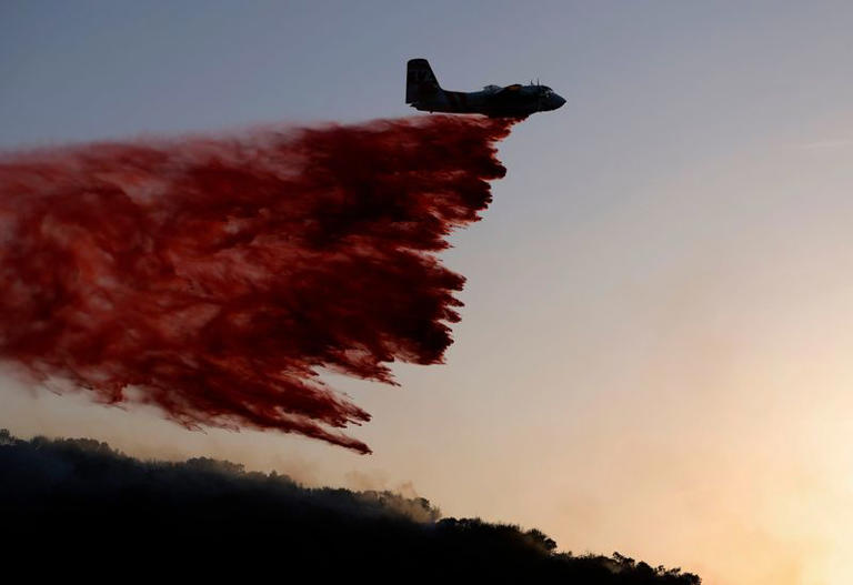 Sandy fire forces evacuations as firefighting aircraft battle fast ...