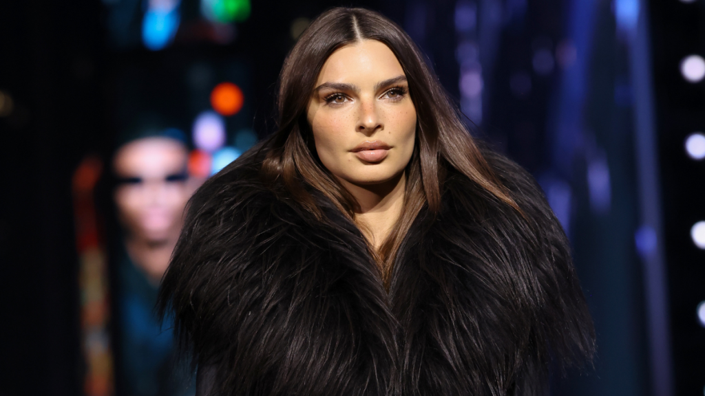 Emily Ratajkowski Puts on a Leggy Display in Tiny Coat as Micro Minidress