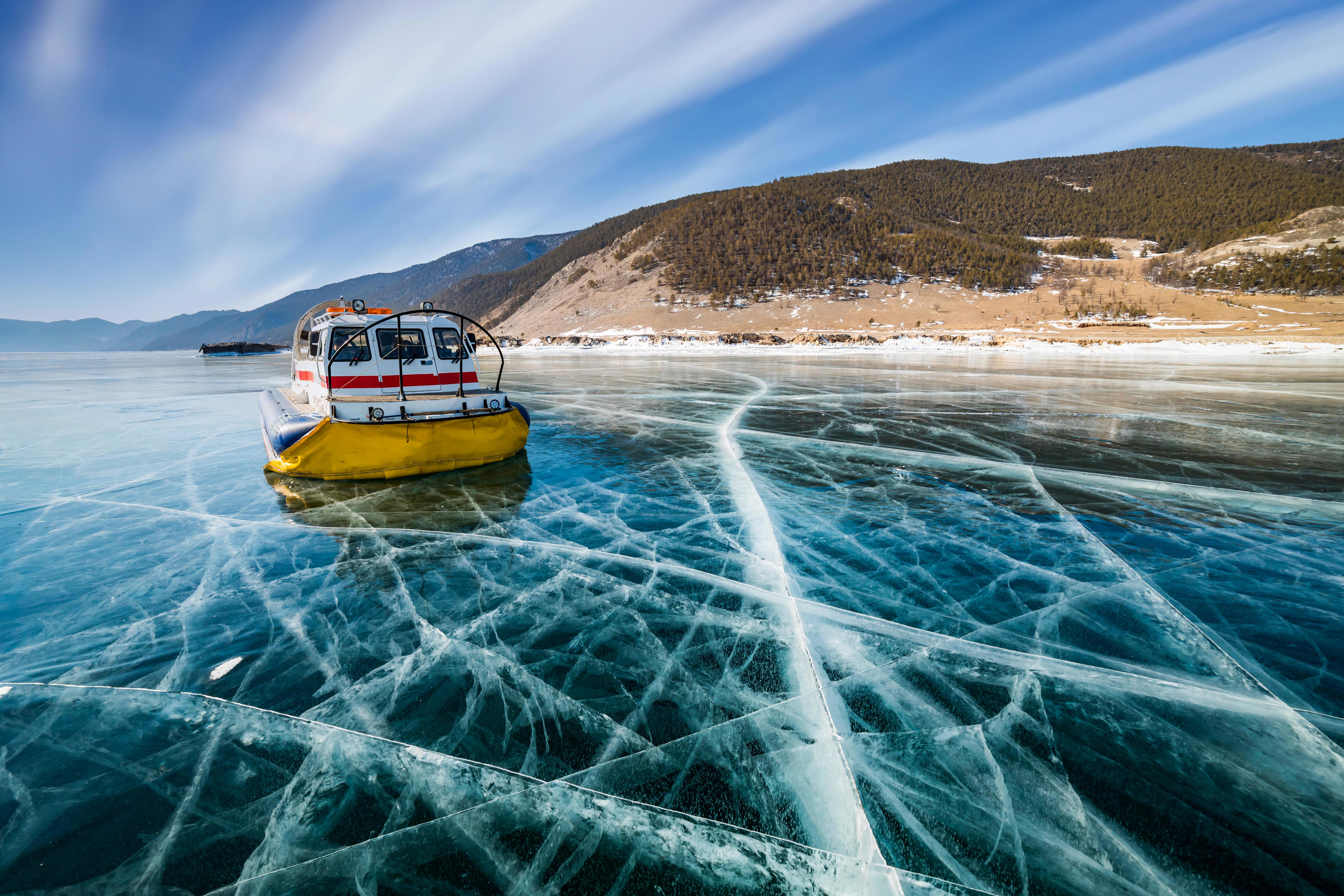 Five dead after overcrowded hovercraft capsizes on icy lake