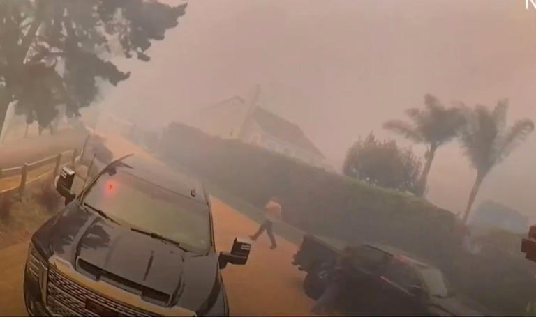 Apocalyptic scene as Sandy Fire sends homeowner fleeing for her life ...