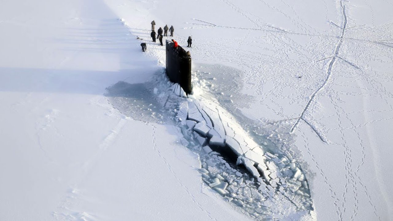 Rare footage shows US submarines breaking through Arctic ice