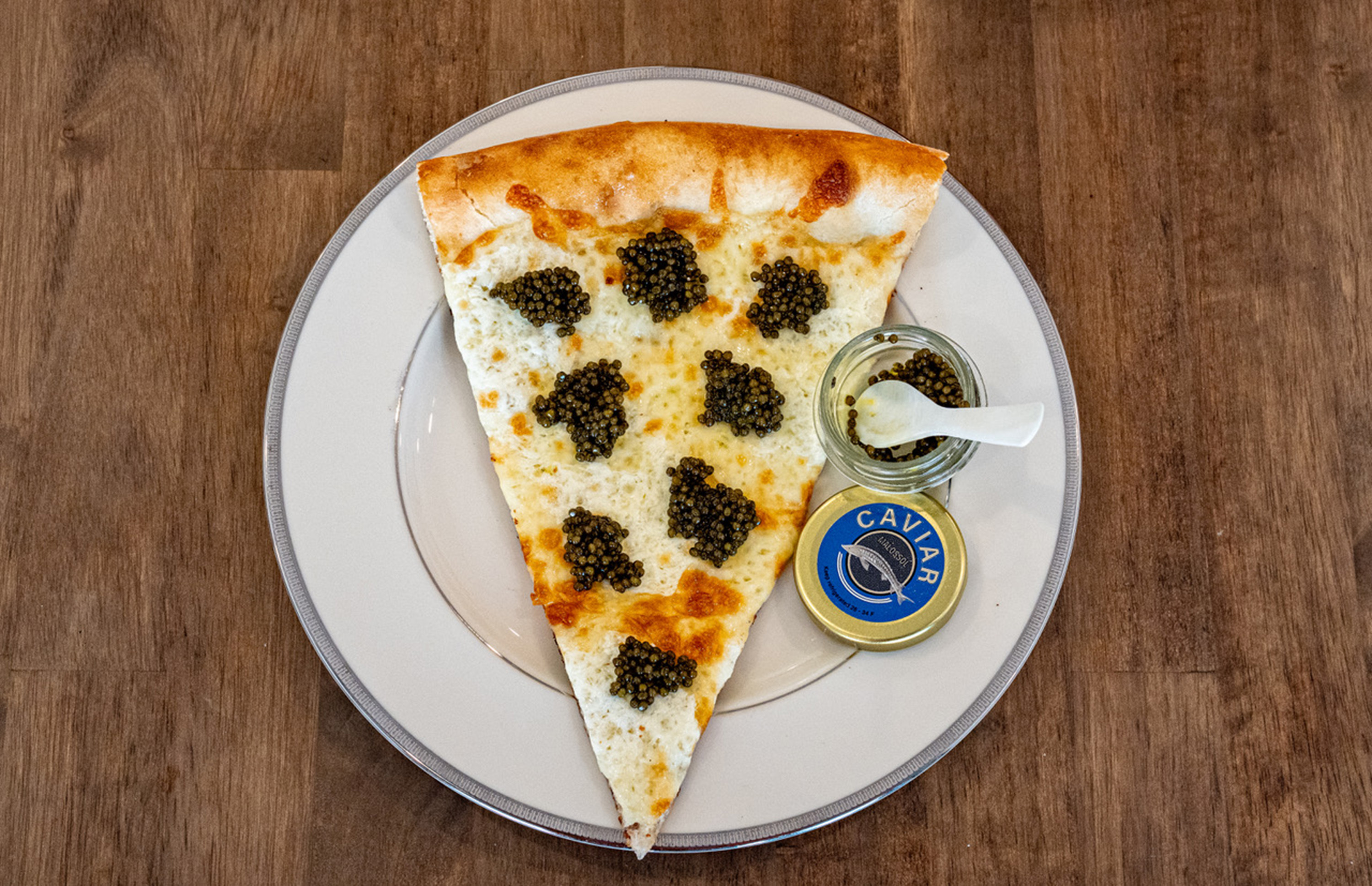 Why is this slice of pizza $55?